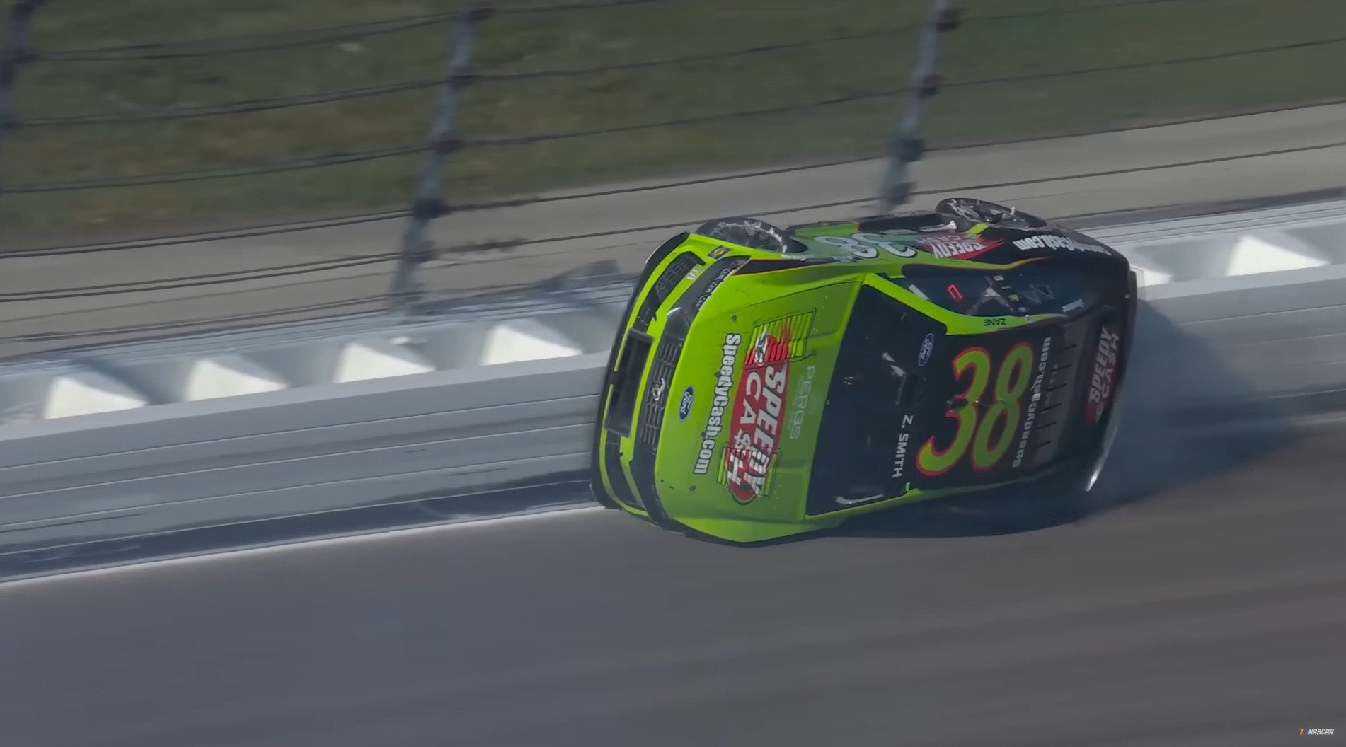 Staggering NASCAR scenes as car rides wall in red flag crash ...